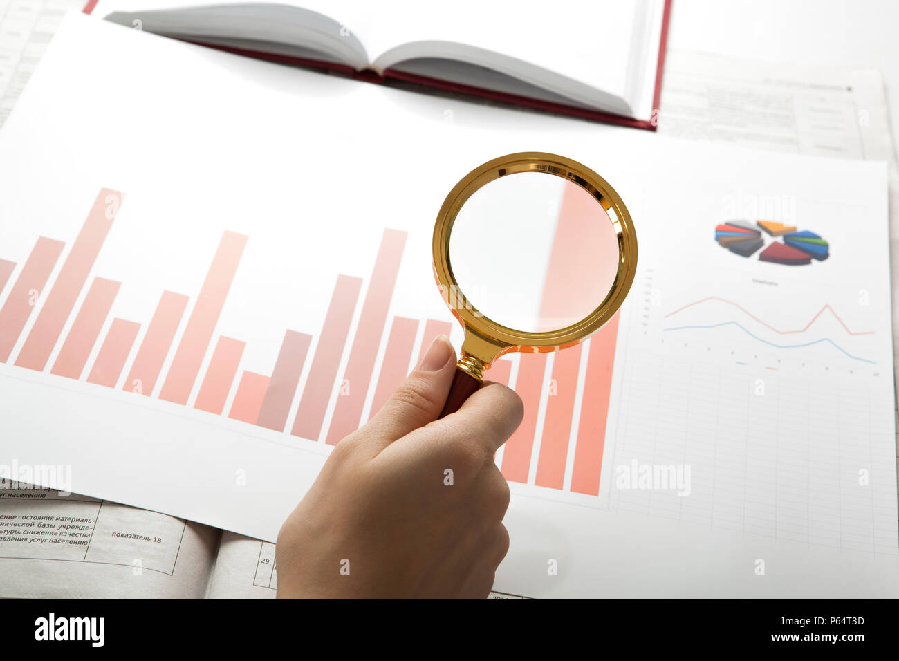 worker examines a magnifying glass text close up Stock Photo - Alamy