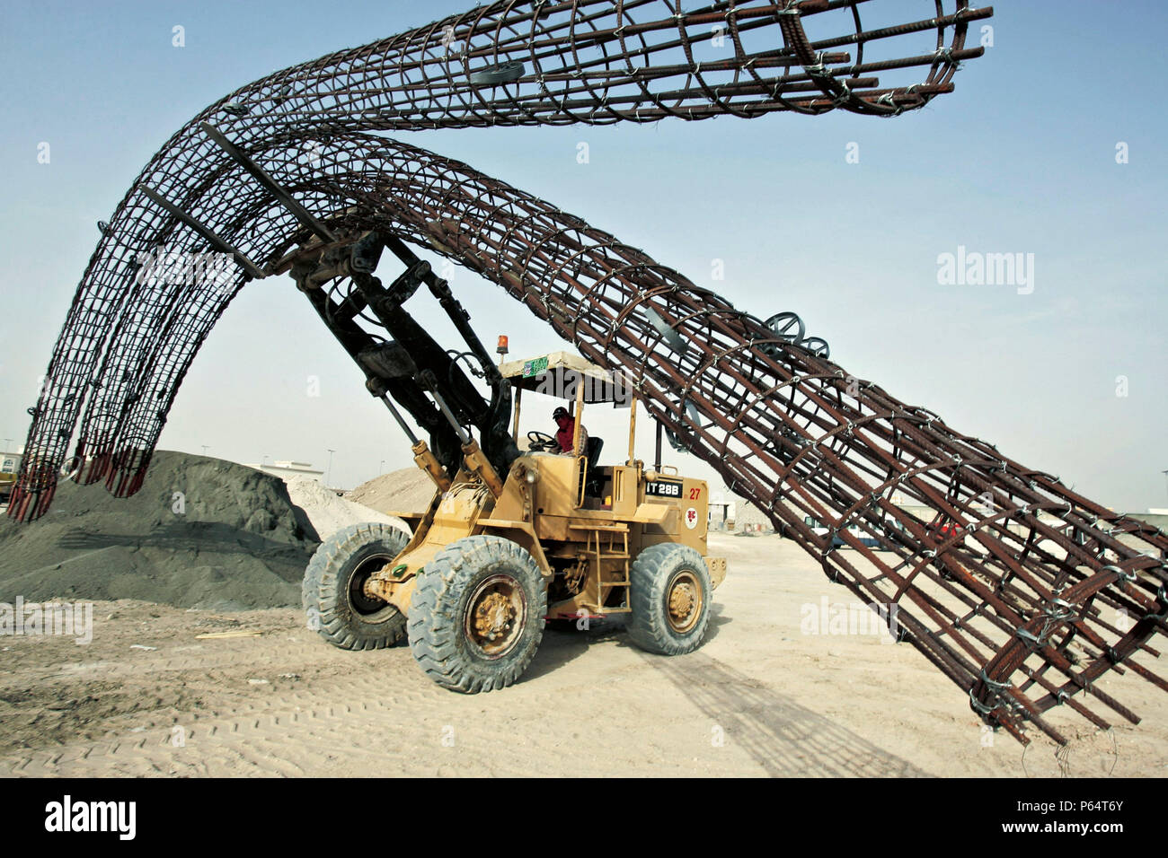 Construction worker lifting rebar hi-res stock photography and images ...
