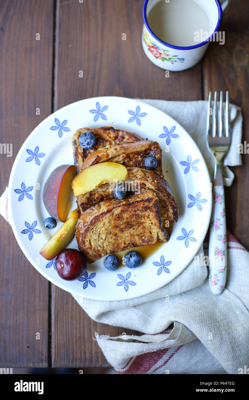 French toast and fruits in a white plate Stock Photo - Alamy