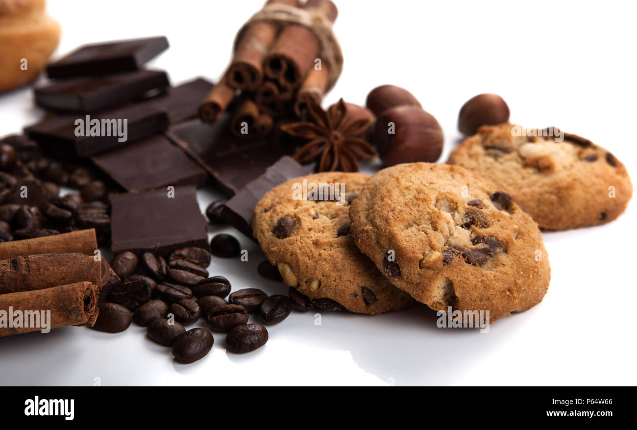 still life of biscuits and chocolate on a white Stock Photo - Alamy