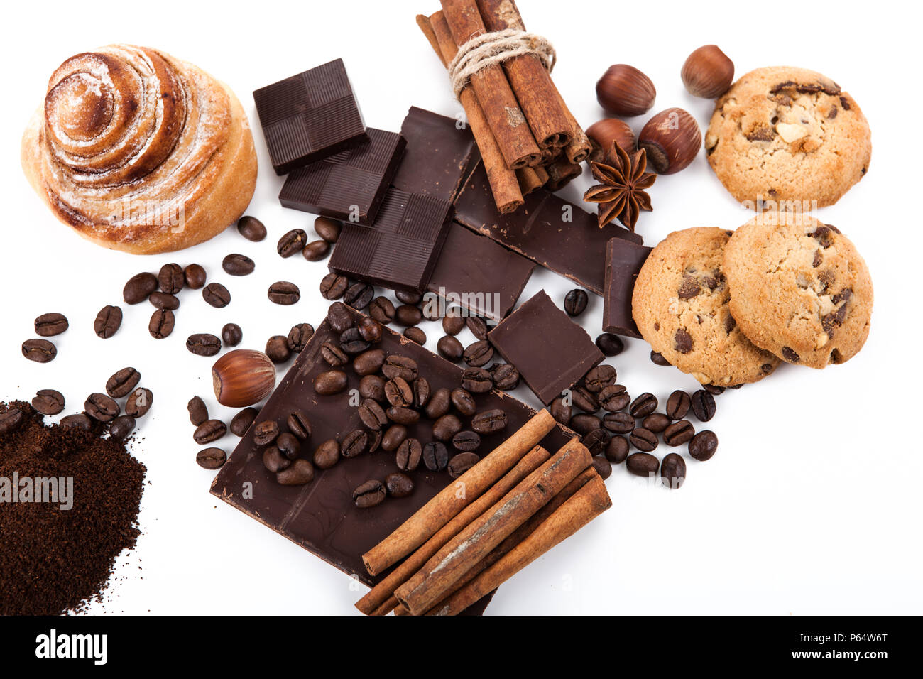 still life of cookies and chocolate on a white Stock Photo - Alamy
