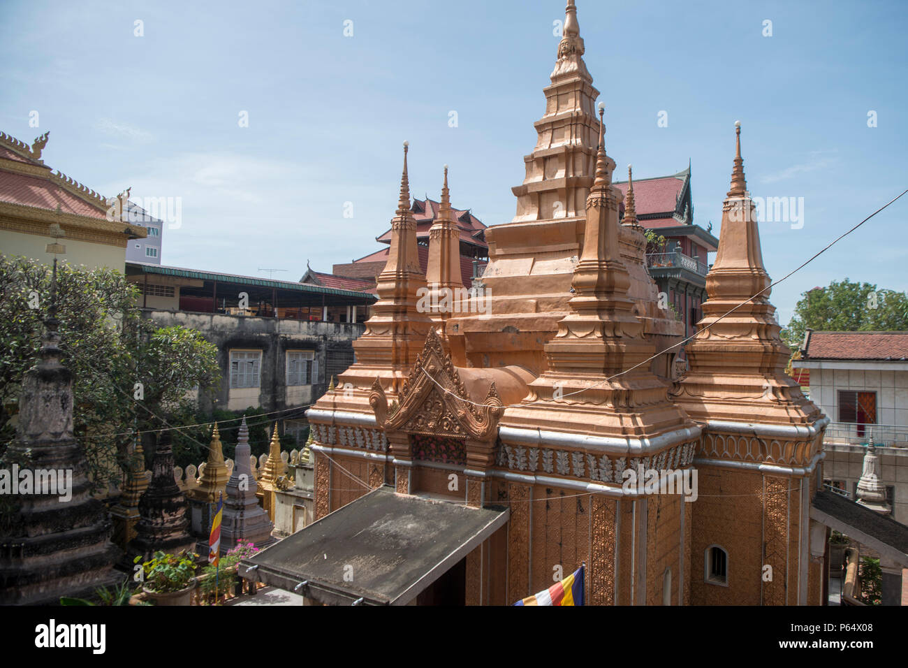 the Wat Ounalom at the Tonle Sap River in the city of Phnom Penh of ...