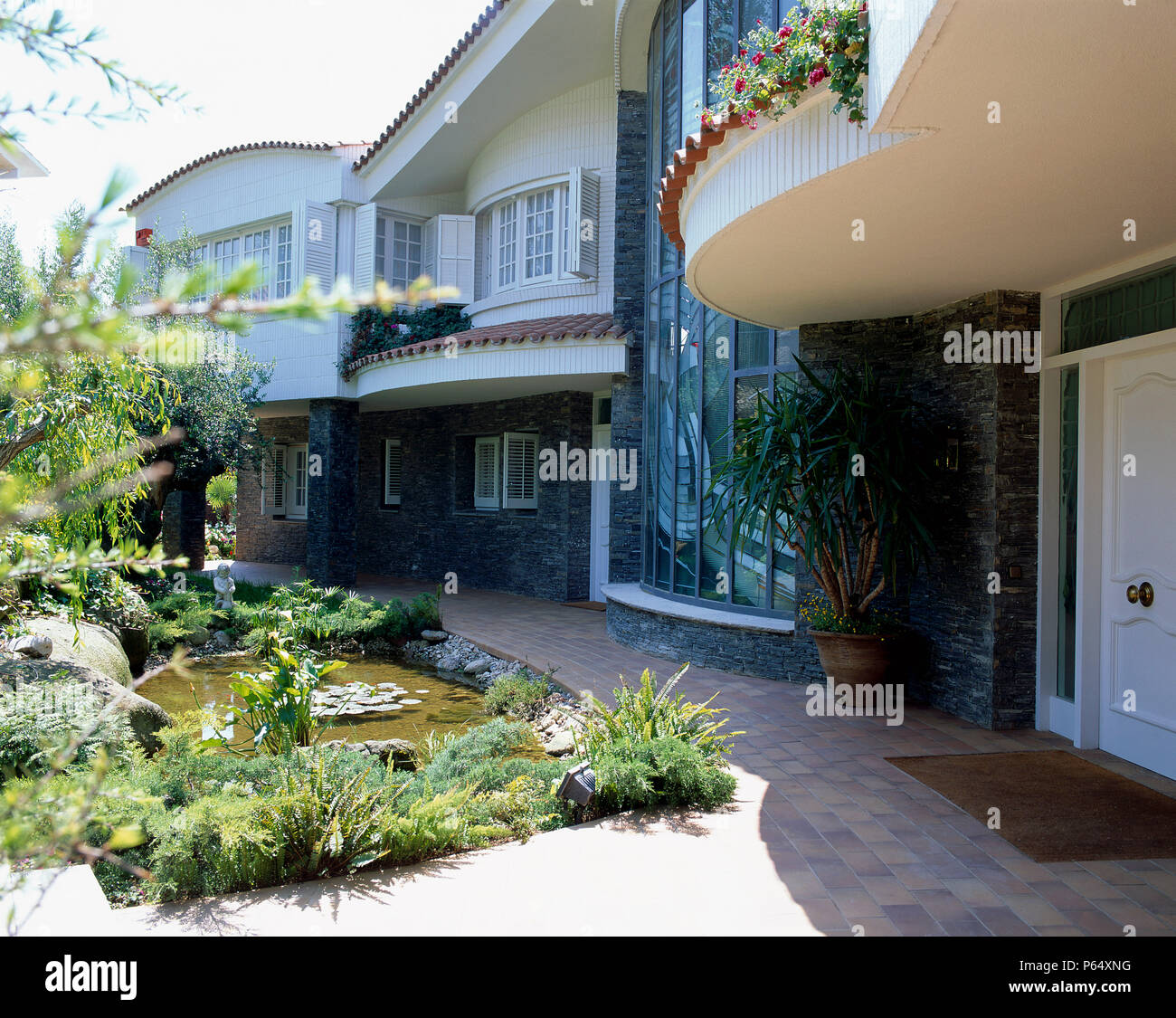 A well landscaped house Stock Photo - Alamy