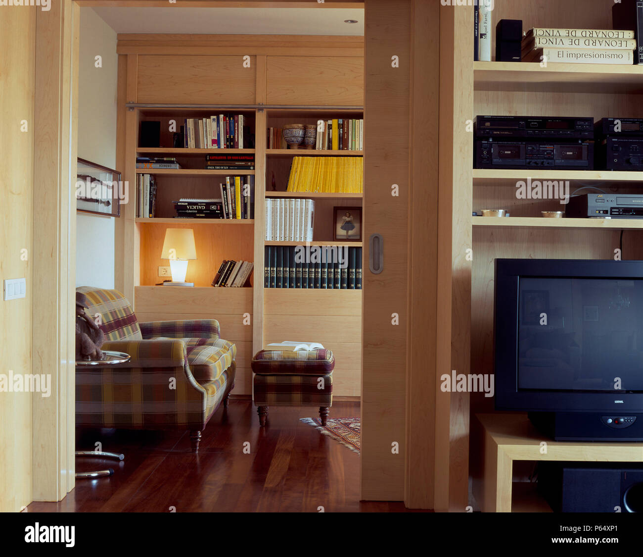 An elegant library through a doorway Stock Photo - Alamy