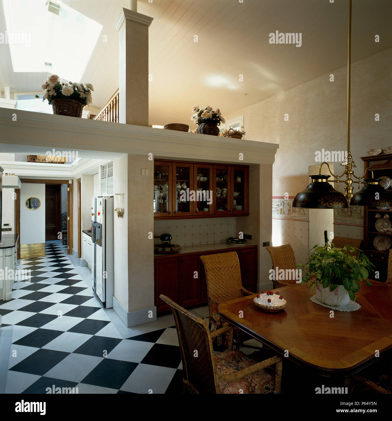 View of a checkered hallway from a dining room Stock Photo - Alamy