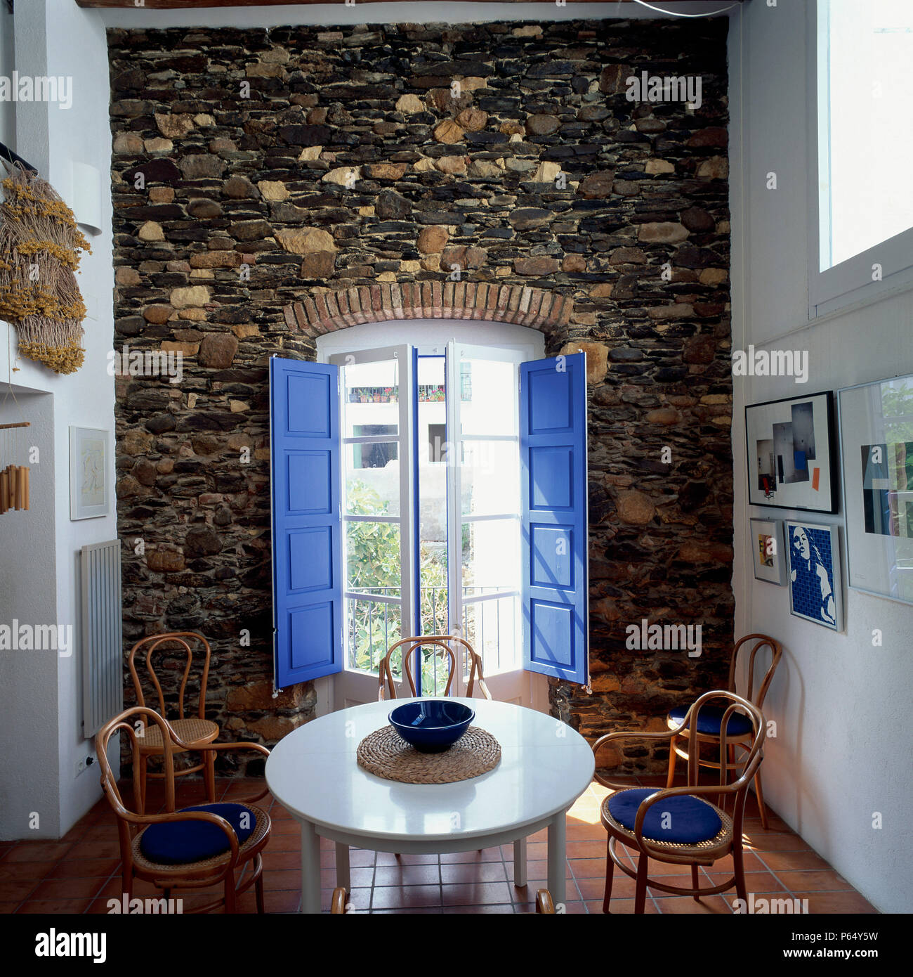 View of a circular dining table Stock Photo - Alamy