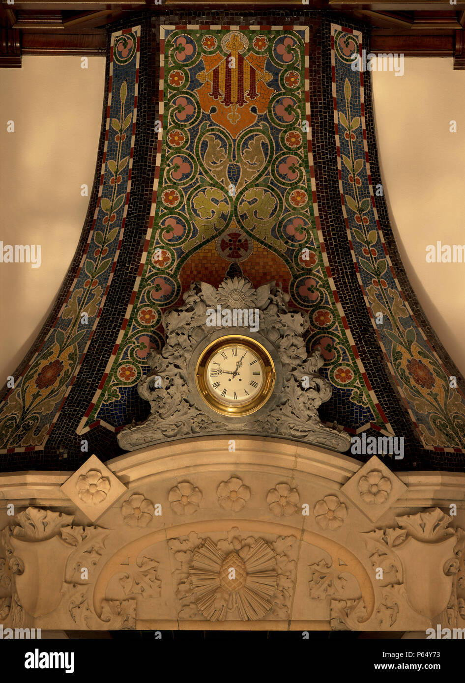 View of a clock on the hood of a fireplace Stock Photo - Alamy