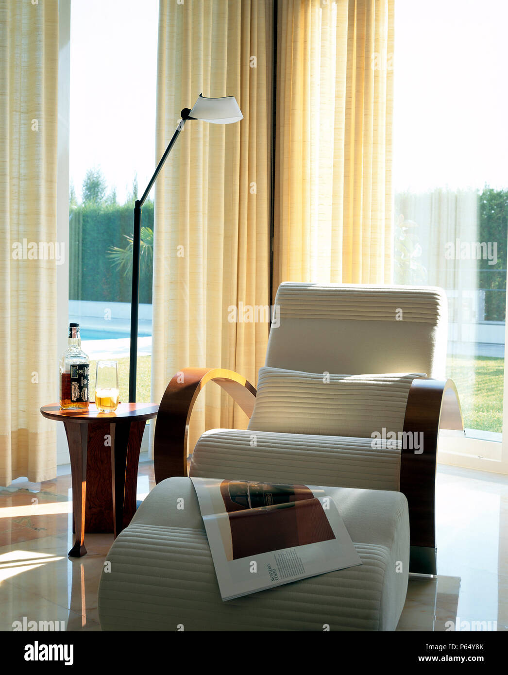 View of a comfortable lounge chair Stock Photo - Alamy