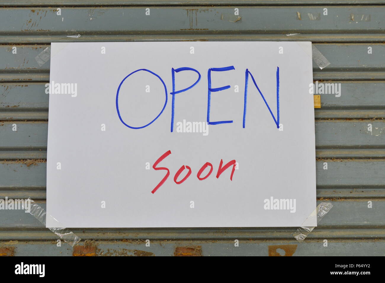 paper sign on iron louver door Stock Photo - Alamy