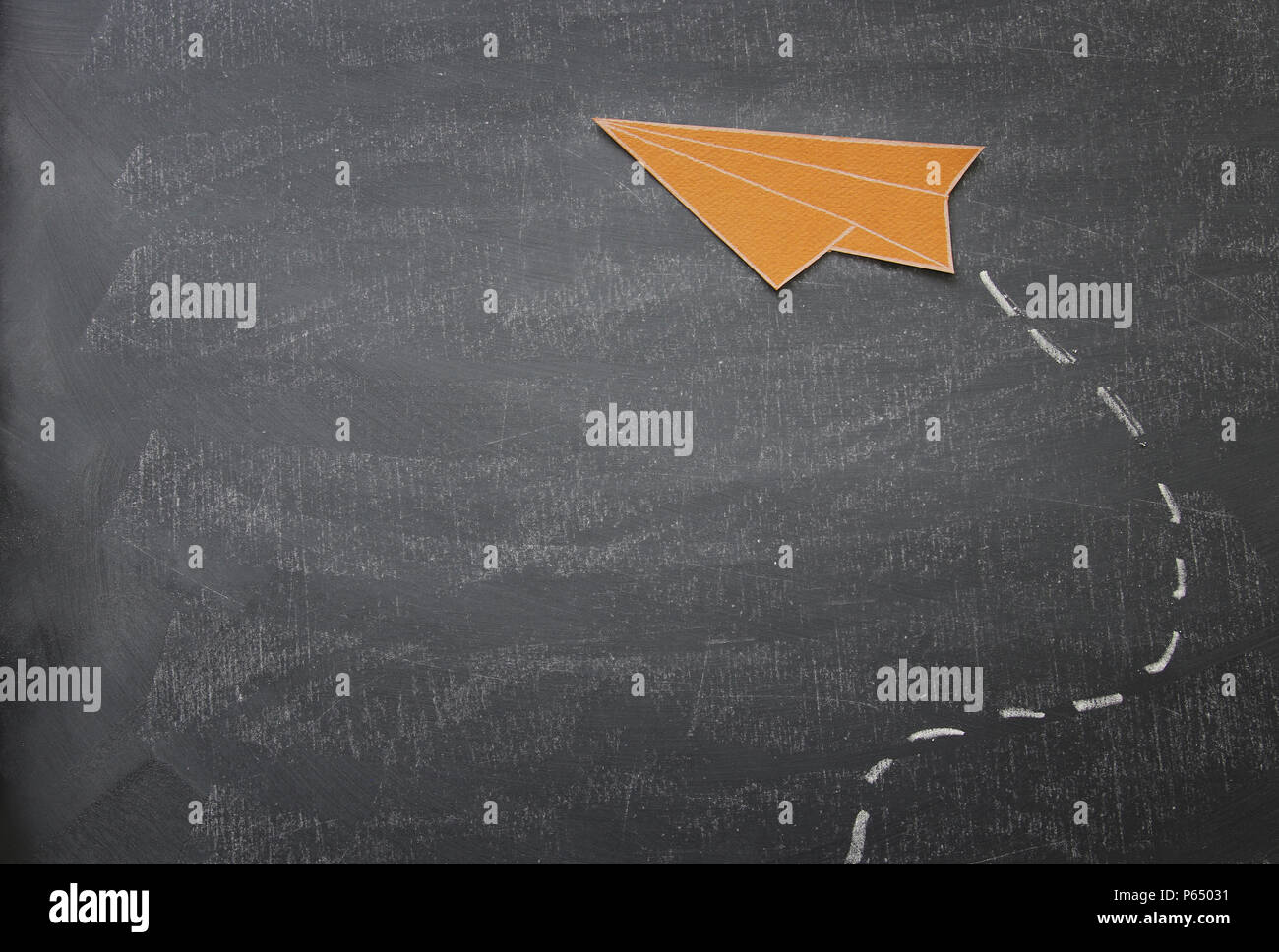 Top view image of paper plane over classroom blackboard background ...