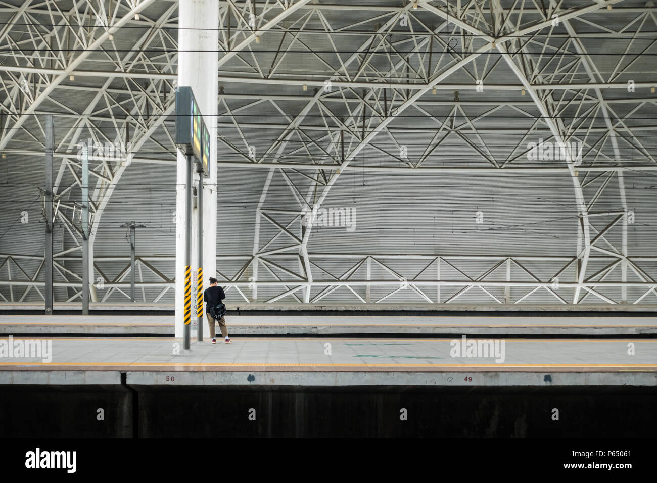 Standing Alone in Massive Train Station Waiting Stock Photo - Alamy