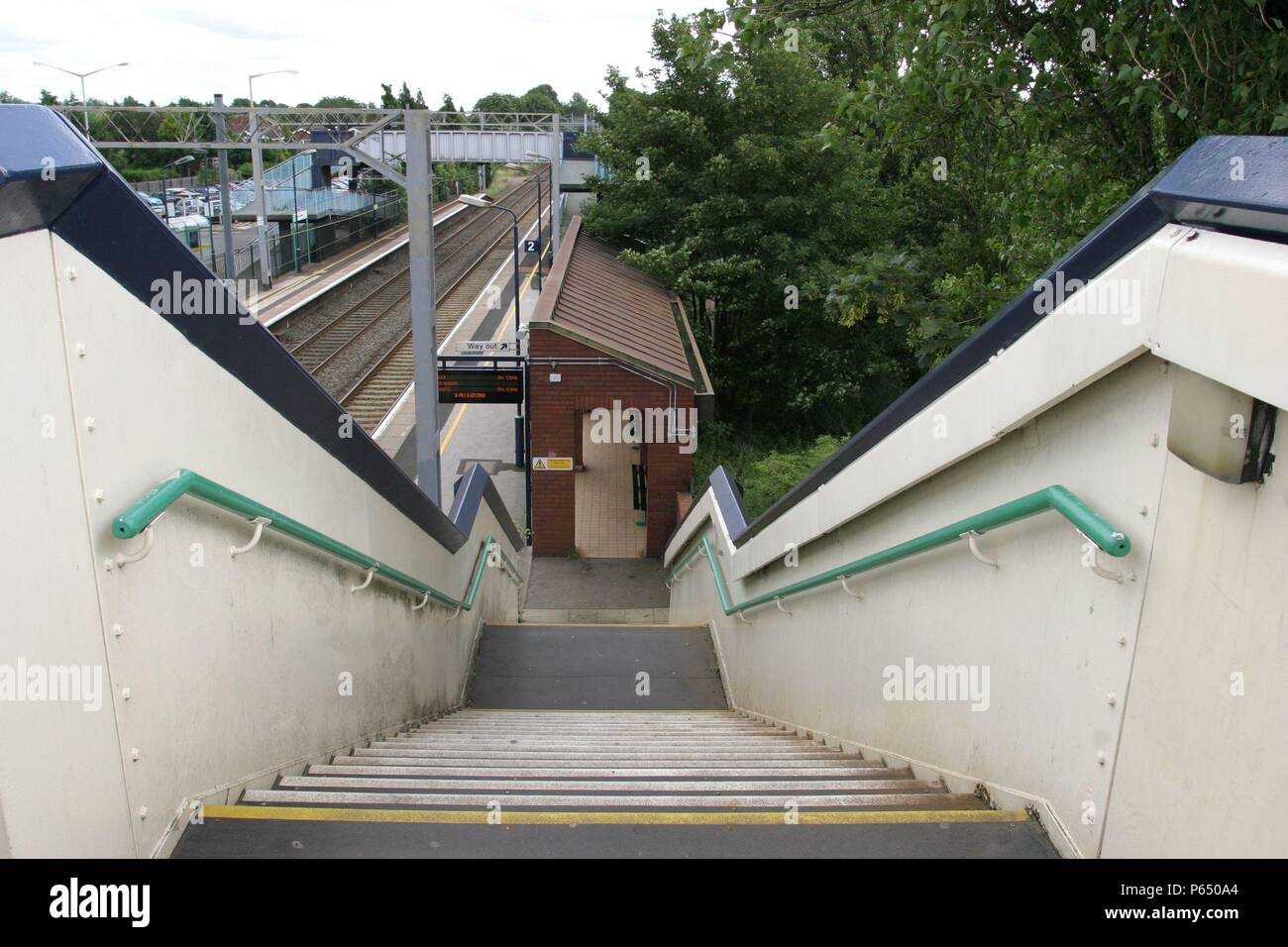 Platform access from the footbridge staircase at Marston Green station ...