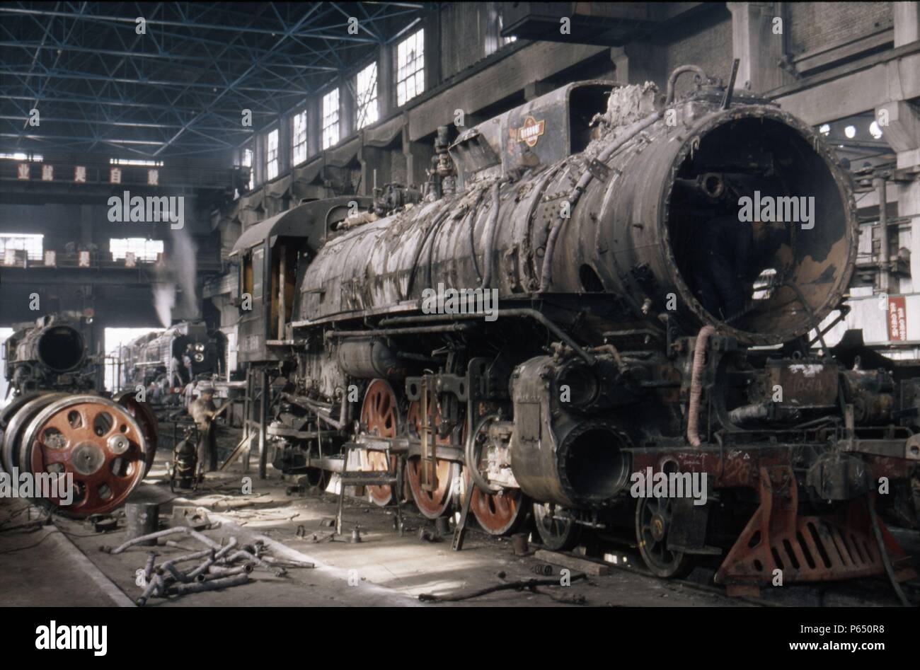 A China Railways RM Class Pacific 4-6-2 undergoes a heavy overhaul at ...
