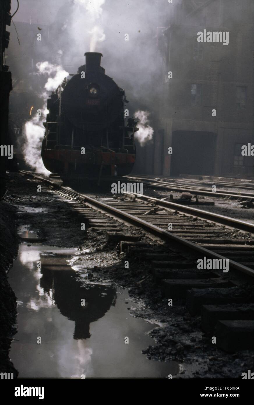 A Chinese Class PL2 industrial Prairie waits to draw a rake of Cauldron ...