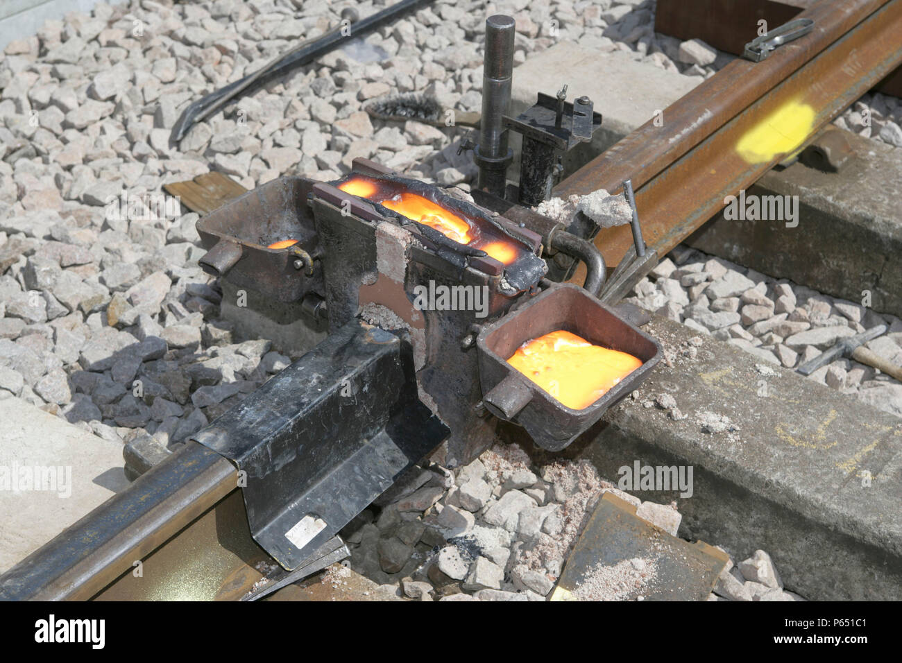 A new section of track is joined using thermit welding techniques at ...