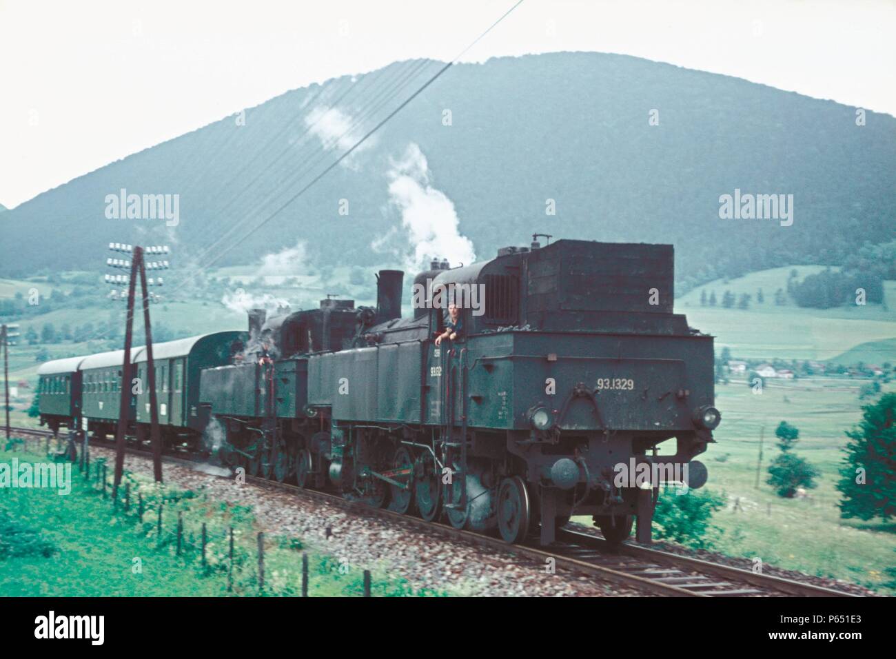 A pair of Austrian Railways 93 Class 2-8-2Ts double head a passenger ...