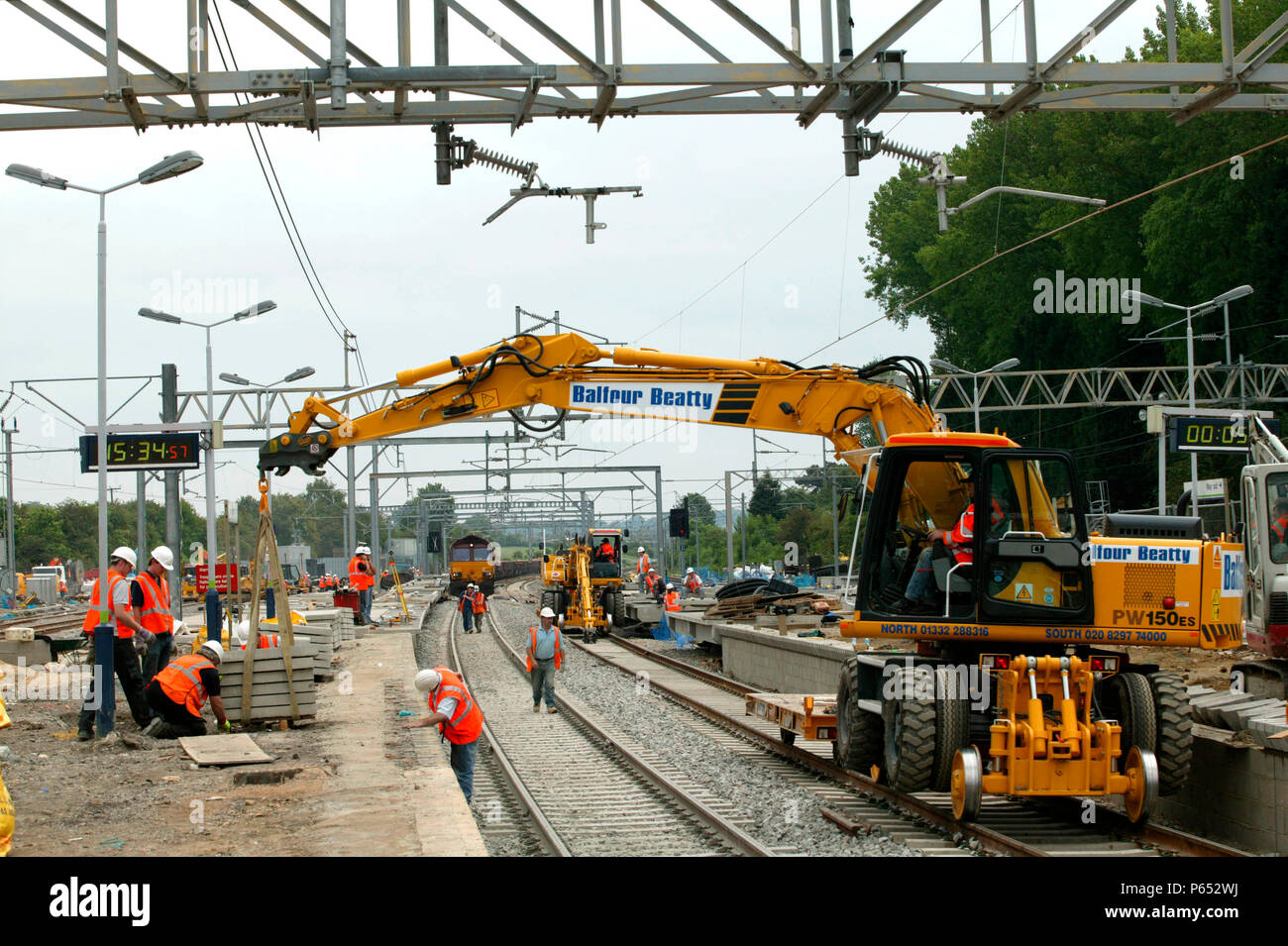 New platform coping stones being lifted into position during the ...