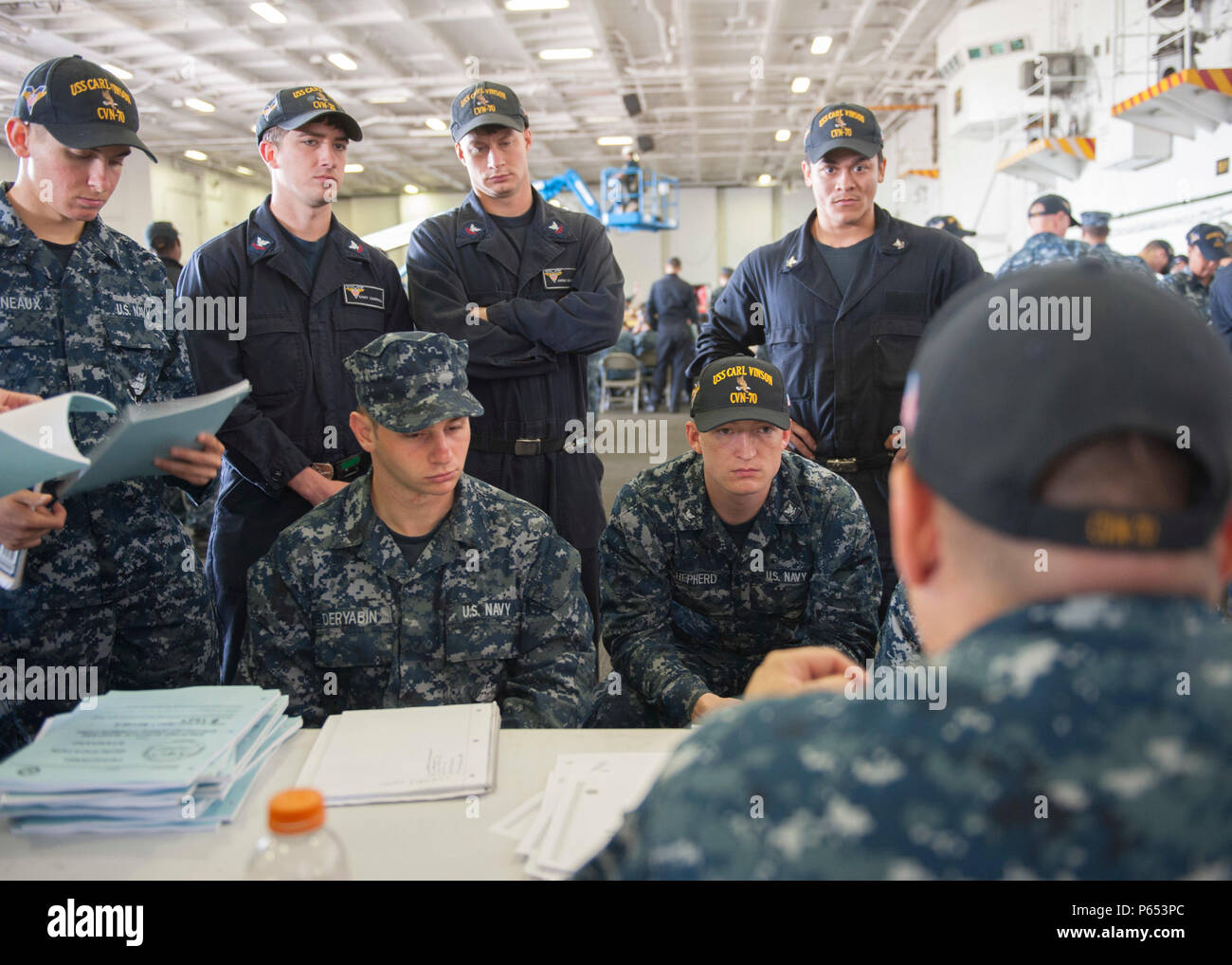 160412-N-GD109-022 SAN DIEGO (April 12, 2016) Sailors listen as ...