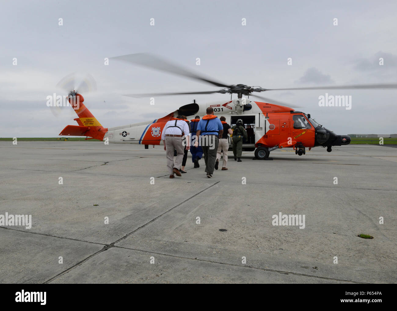 NEW ORLEANS - U.S. Senator Bill Cassidy staff delegates board an MH-60 ...
