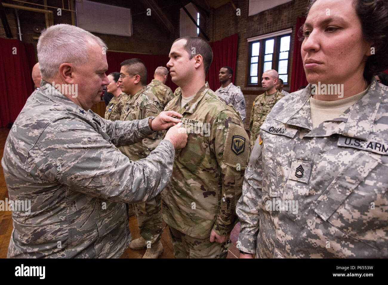 Brig. Gen. Michael L. Cunniff, left, The Adjutant General of New Jersey, presents the ...