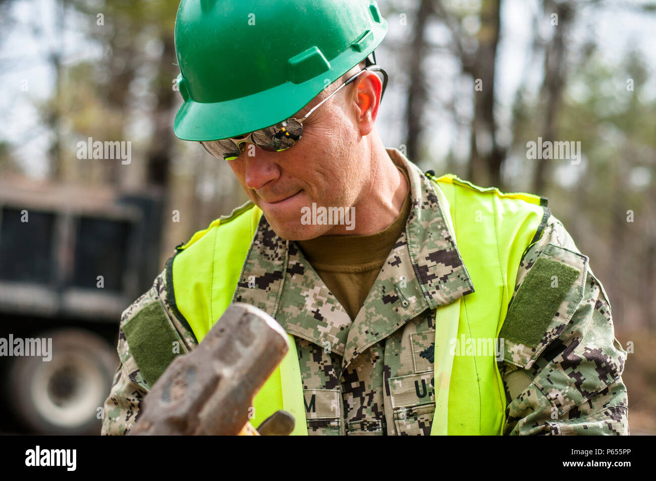 Engineering Assistant 2 Class Michael Meacham, U.S. Navy, build ...