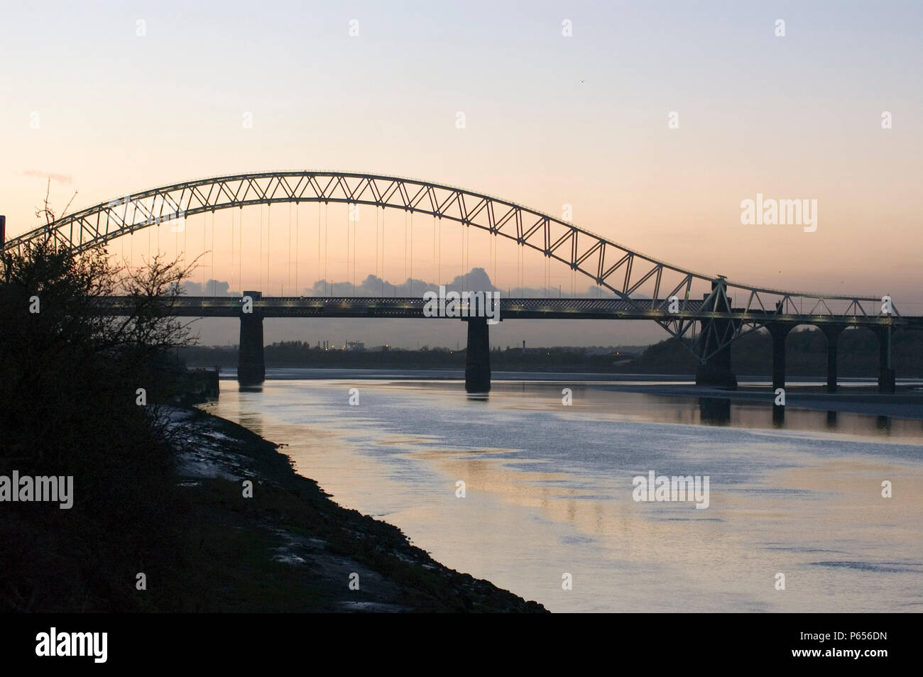 Runcorn Road Bridge and Manchester Ship Canal over the river Mersey ...