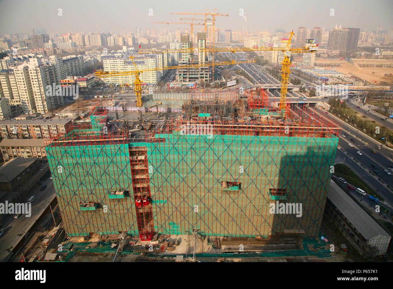 A new office block under construction at Dongzhimen in central Beijing ...