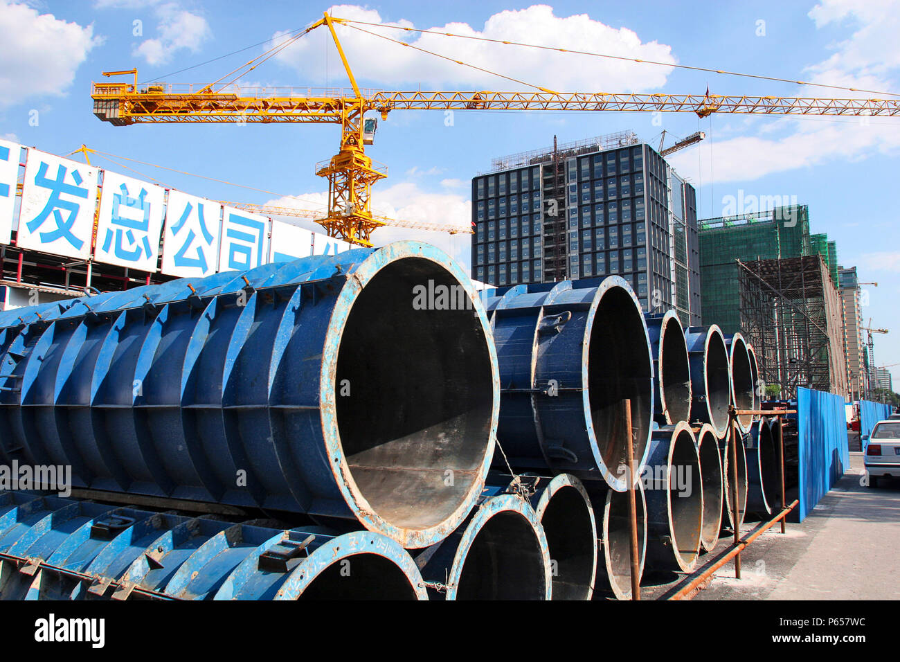 Pipes stacked near a construction site in Dongzhimen in Beijing Stock ...