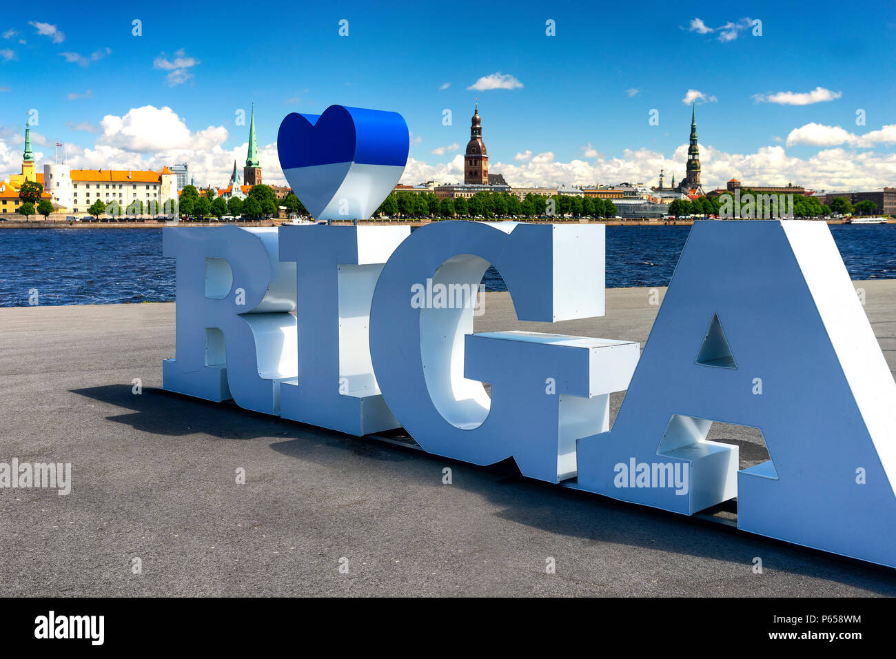 The inscription Riga with the symbol of the heart against the backdrop ...