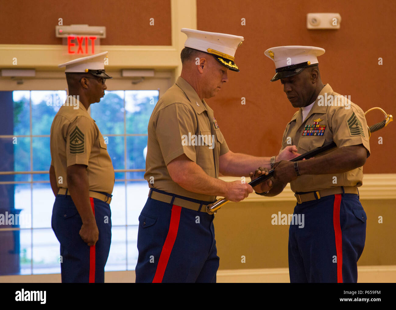 U. S. Marine Corps Sgt. Maj. Johnnie M. Hughes, oncoming sergeant major ...