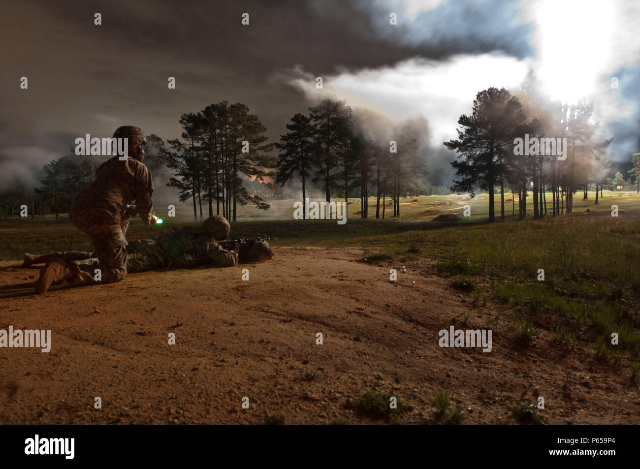 A 2016 U.S. Army Reserve Best Warrior competitor fires downrange at the ...