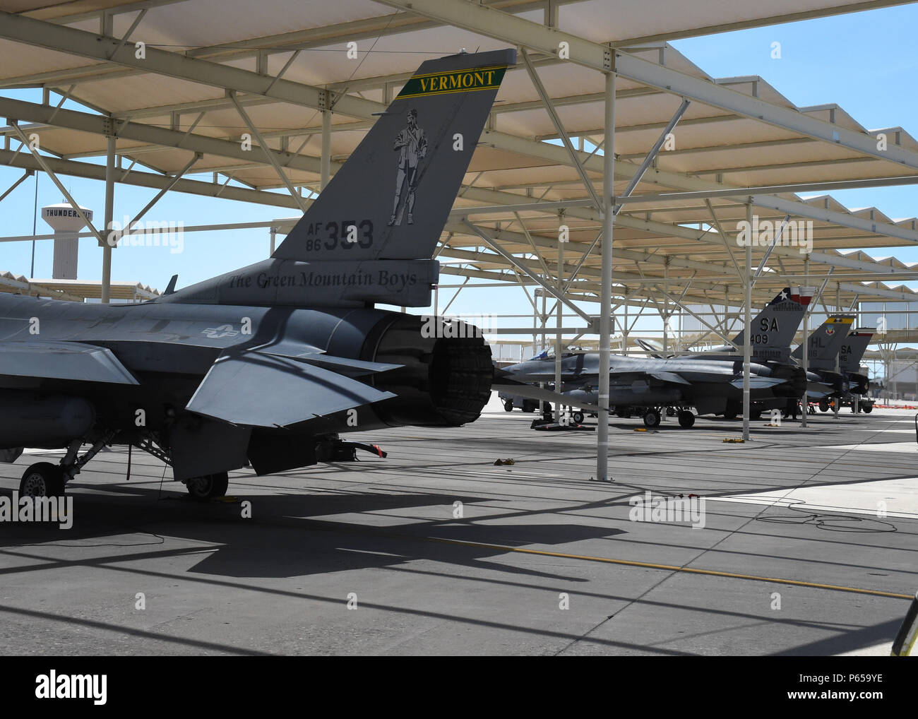 F-16 Fighting Falcons sit on the aircraft parking ramp at Luke Air ...