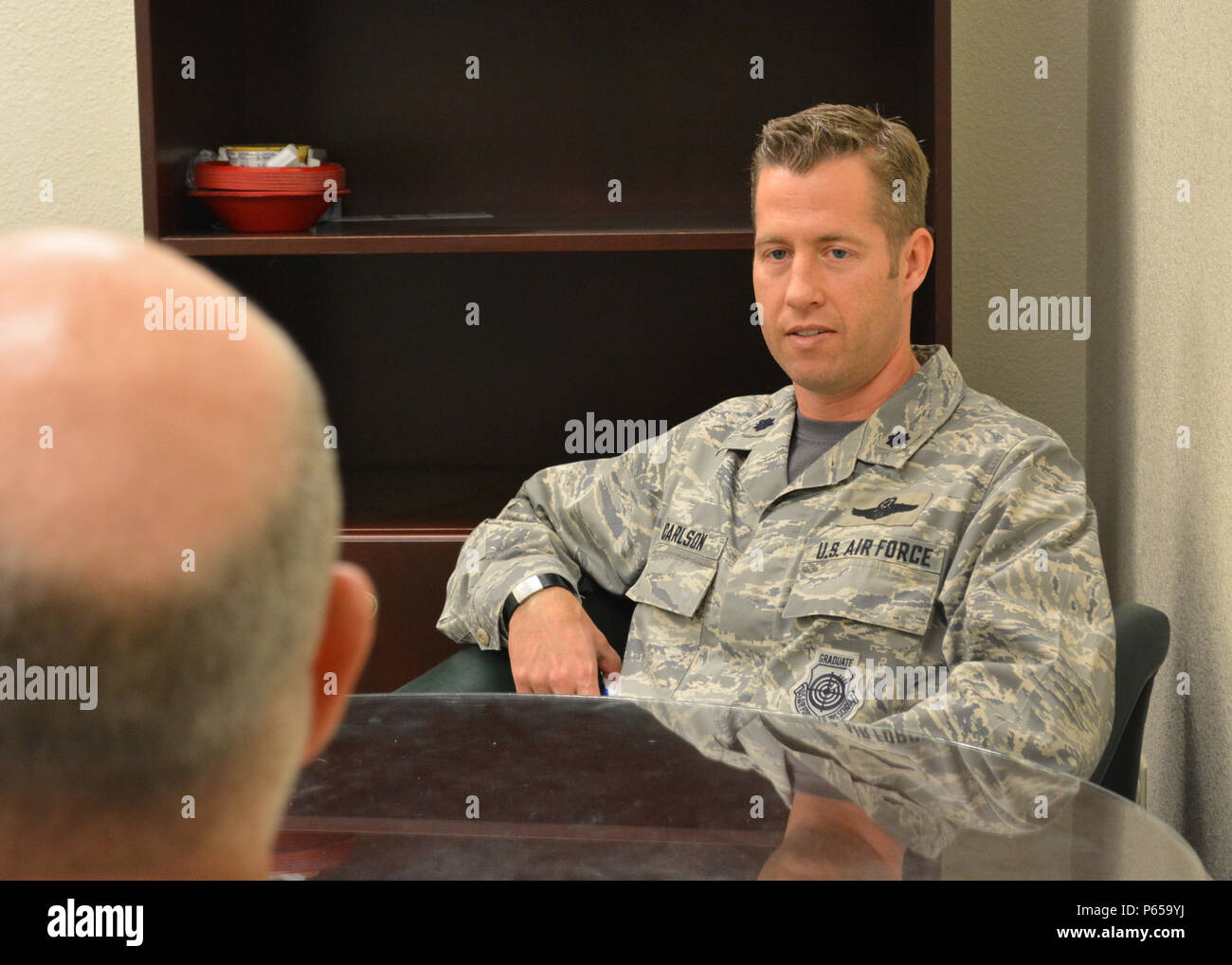 Lt. Col. Bryan Carlson (right), an F-16 Fighting Falcon instructor ...
