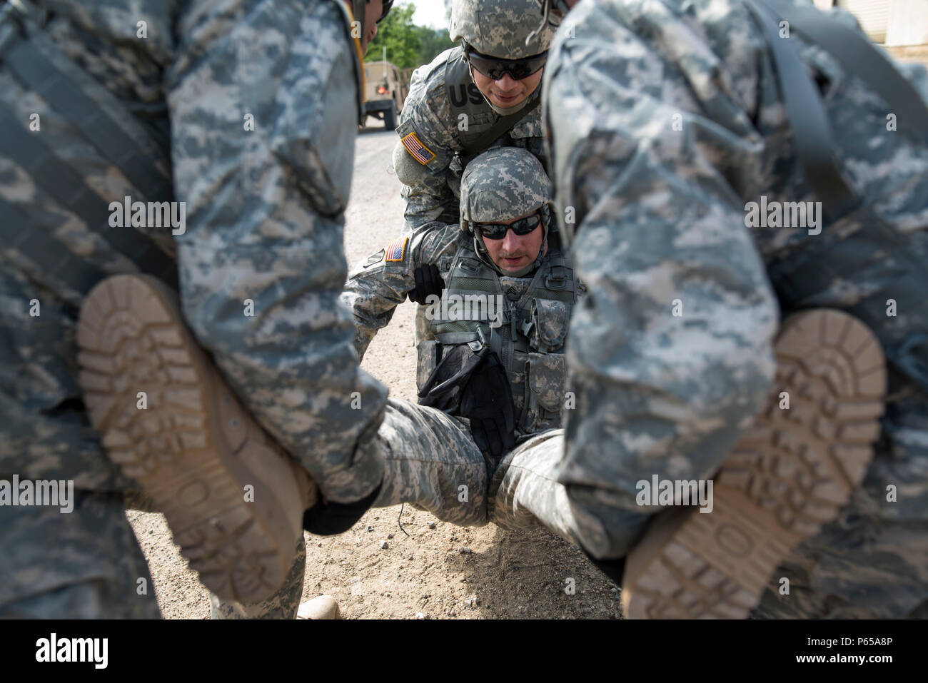 U.S. Army Reserve Soldiers from the 223rd Maintenance Company, of Grand ...