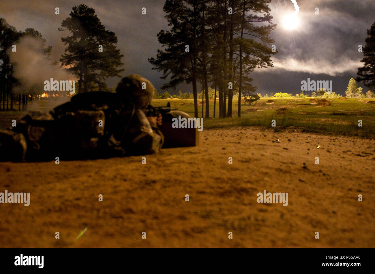 Spc. Michael Orozco of the 416th Engineering Command (Theater) engages ...