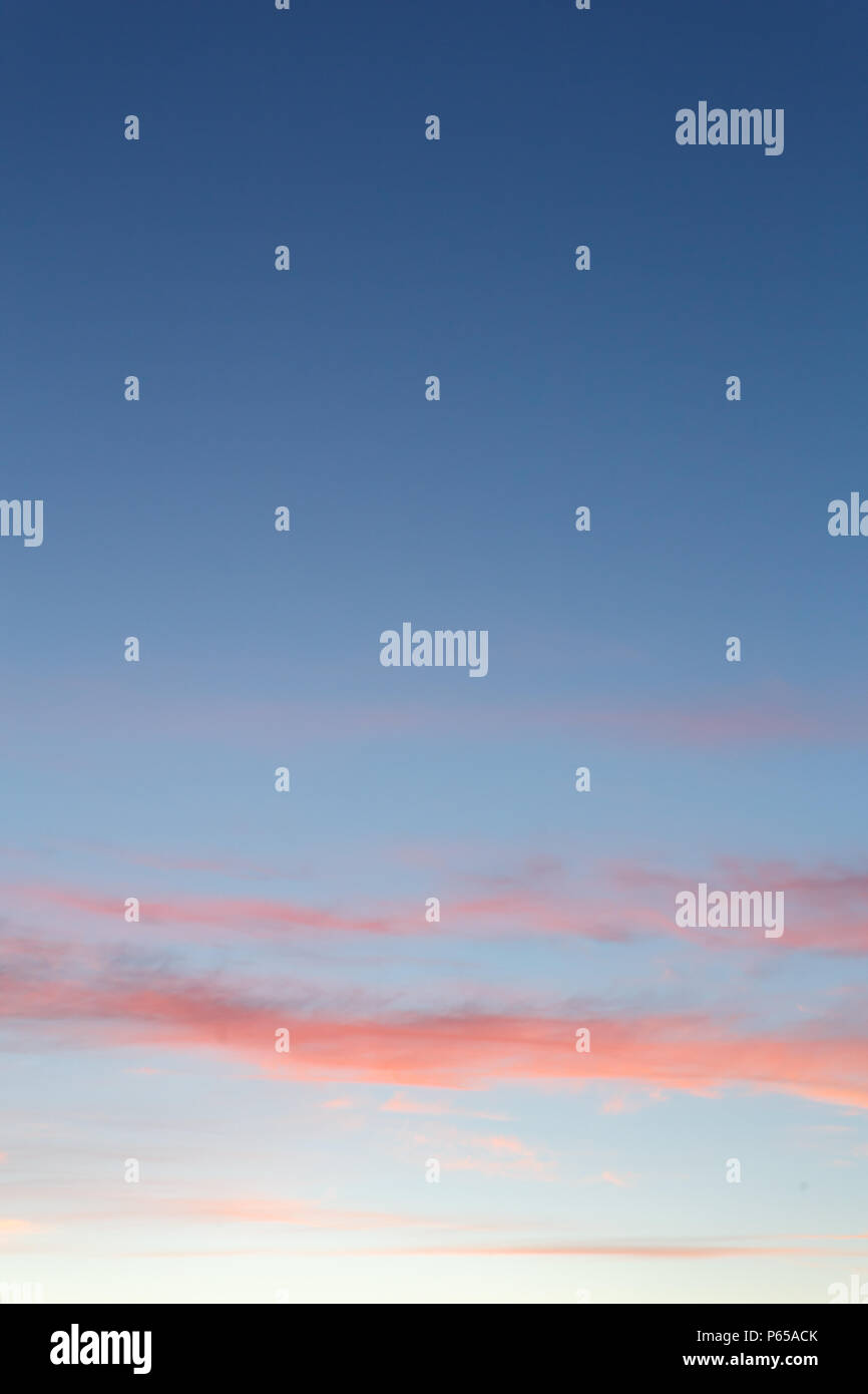 Beautiful sunset sky with pink and blue colors, windy lines Stock Photo ...