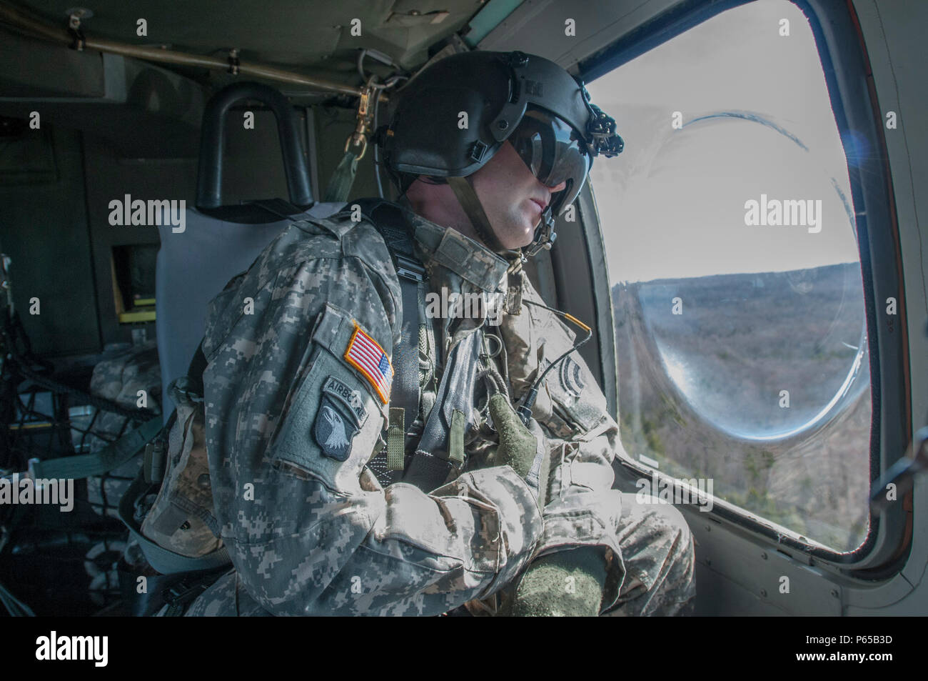 U.S. Army Sgt. Carlton Quenneville, crew chief, Charlie Company, 3rd ...