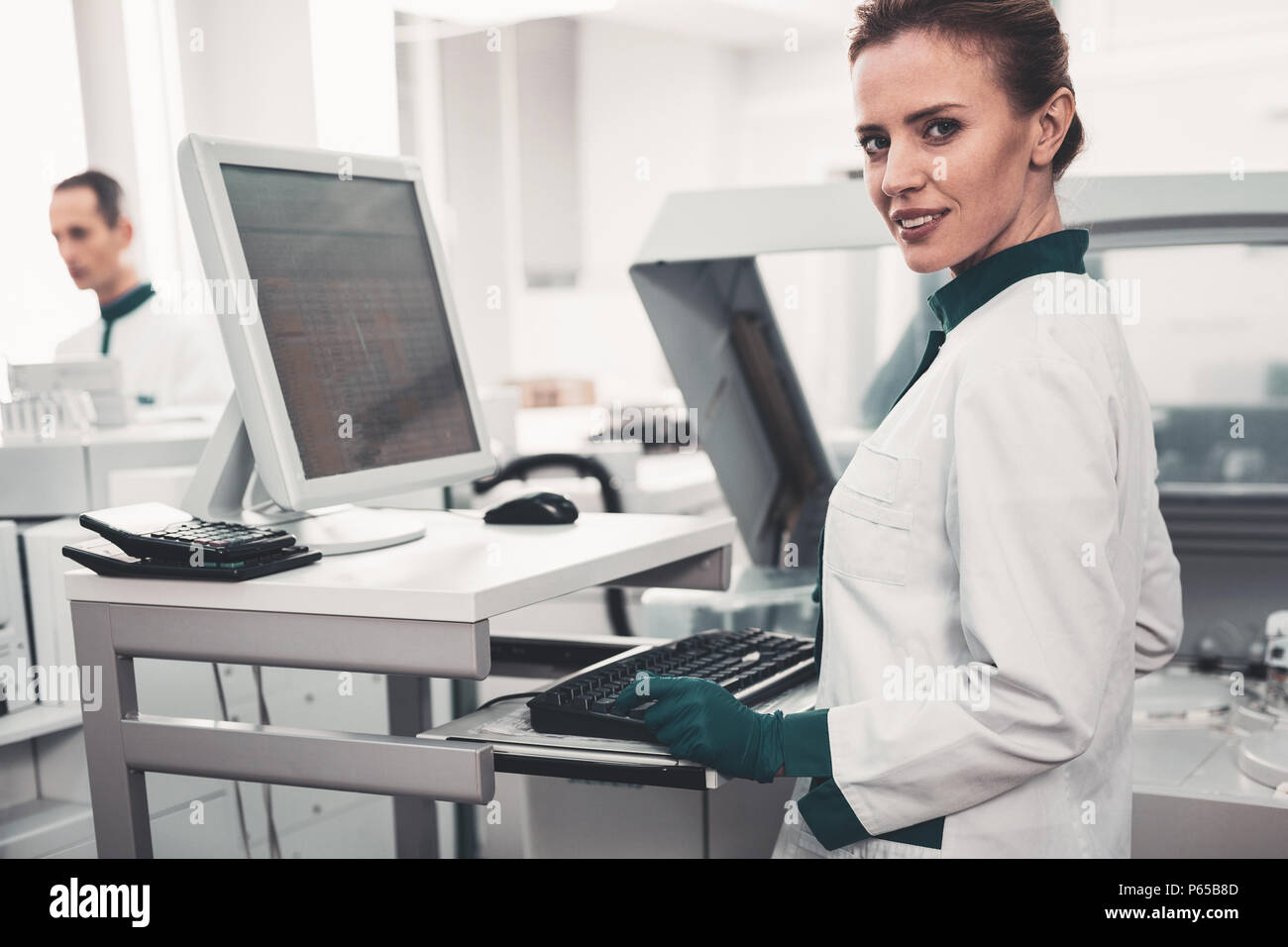 Scientists using modern computer technology hi-res stock photography ...