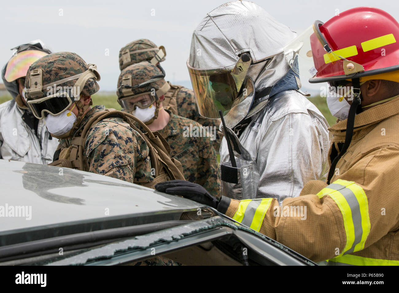Spanish firefighters with Morón Fire Department observe U.S. Marine ...