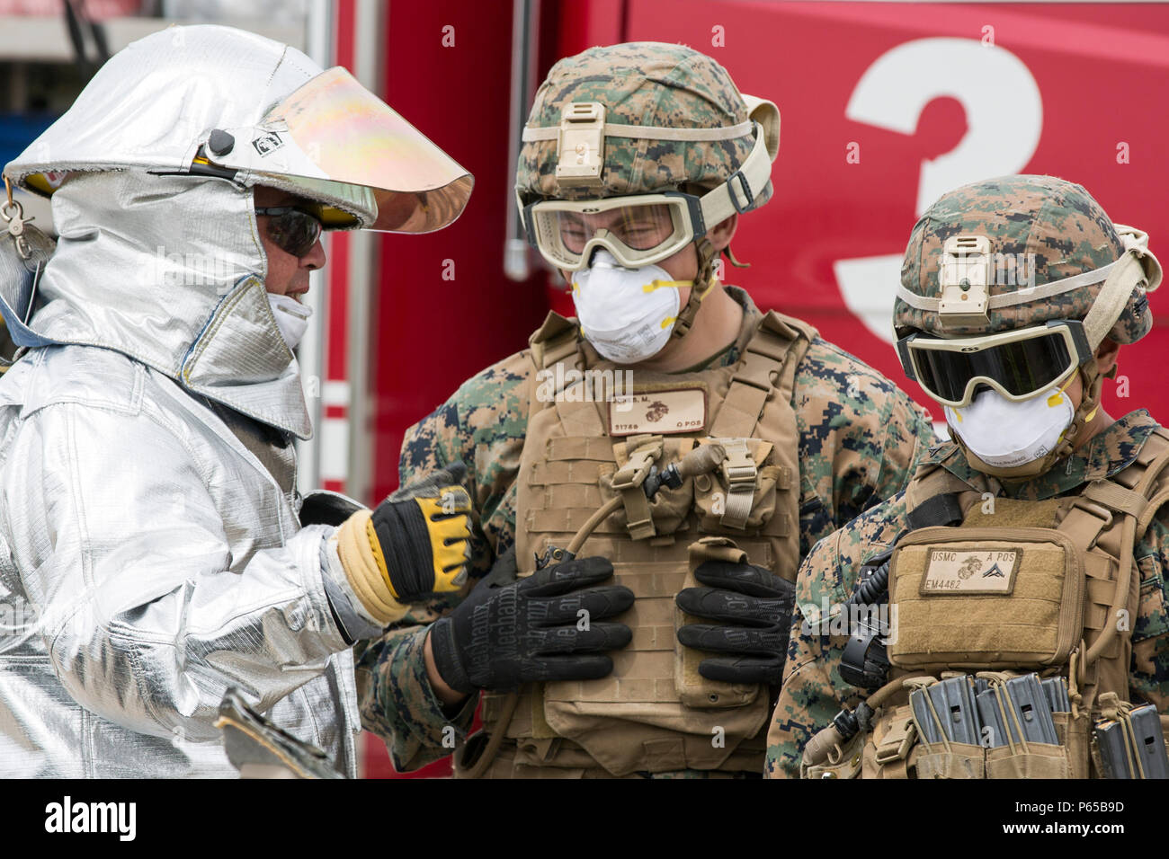 James Denton, (left), a Spanish Firefighter with Morón Fire Department ...