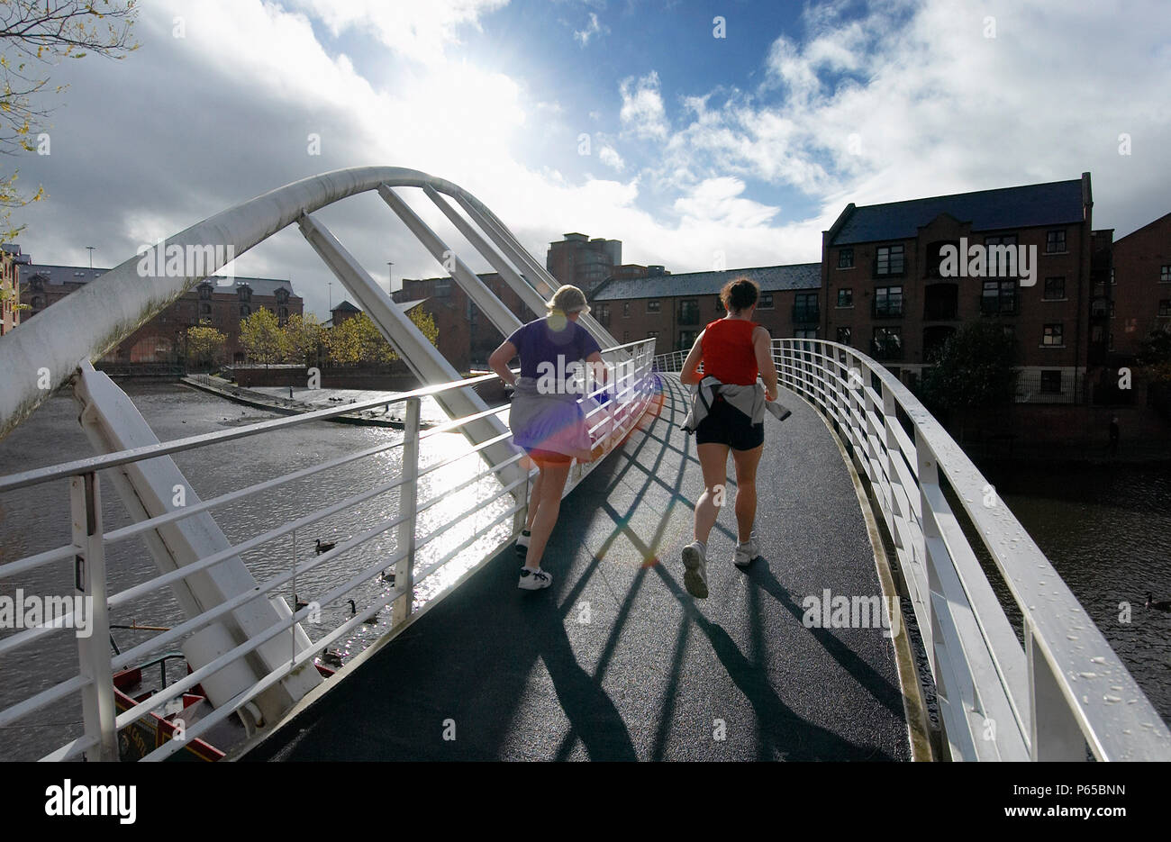 Merchants Bridge, Catalan Square, Manchester, UK. Dramatic curving ...