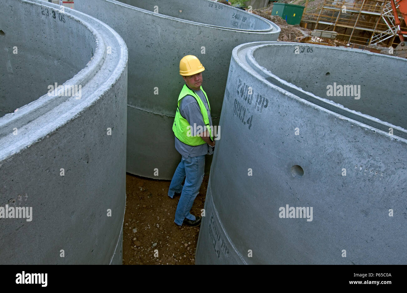 Builder urinating on site Stock Photo - Alamy