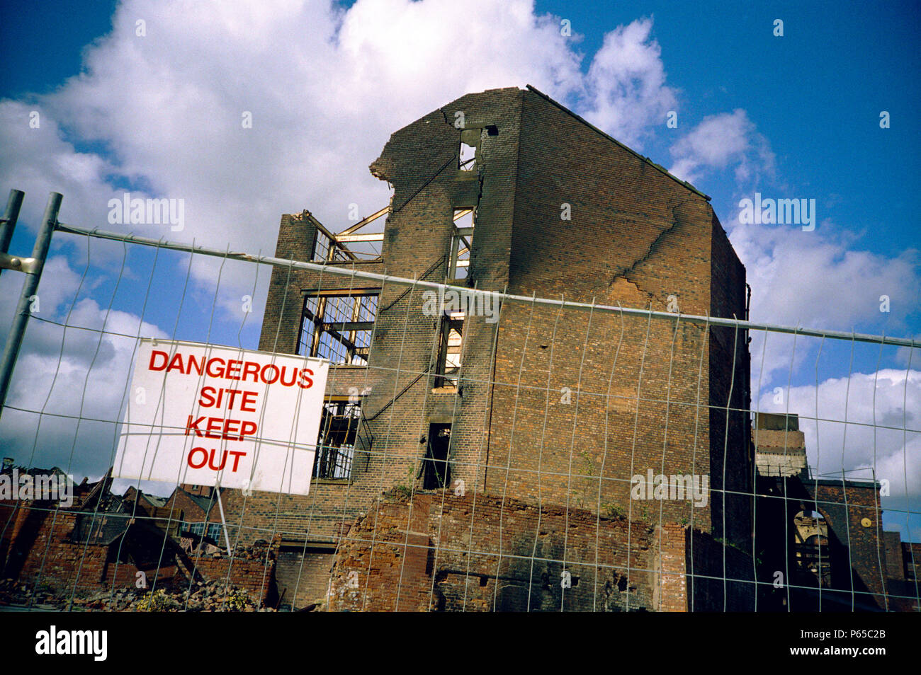 Demolition work in progress Stock Photo - Alamy