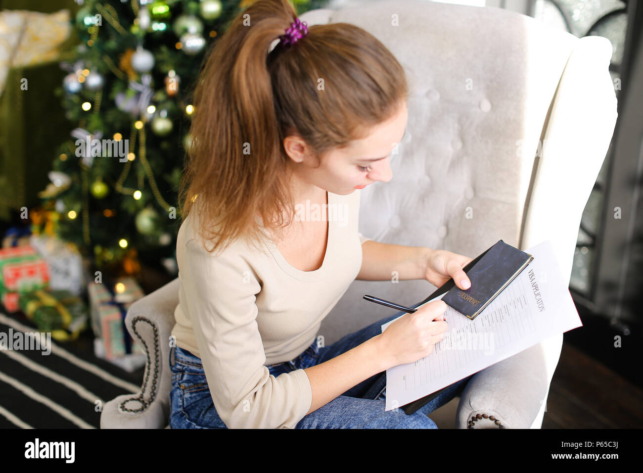 student female preparing documents for getting visa to study abr Stock ...