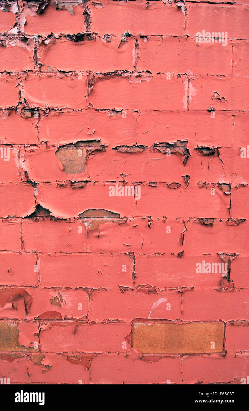 Detail of paint peeling of a brick wall Stock Photo - Alamy