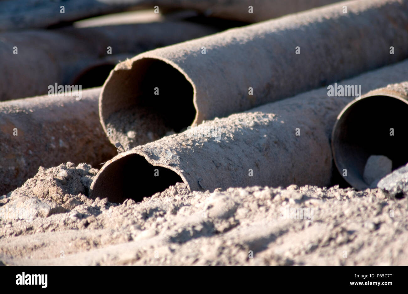 Pile of broken pipes Stock Photo - Alamy