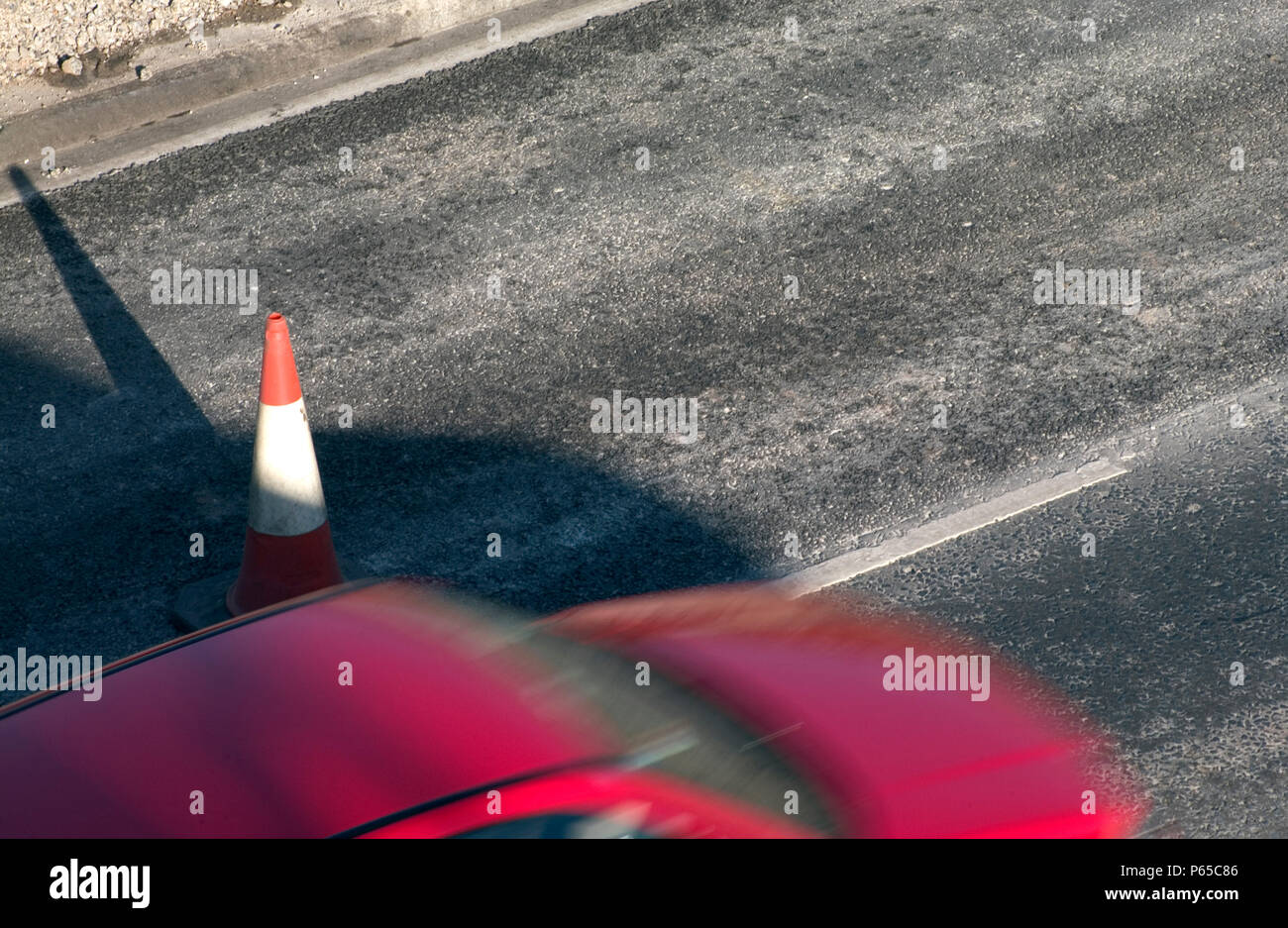 Red cones on a motorway Stock Photo - Alamy