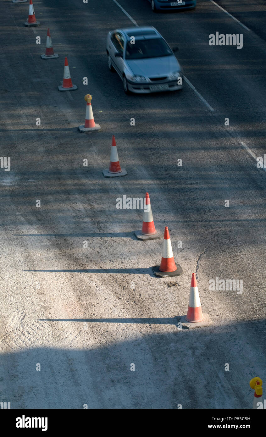 Red cones on a motorway Stock Photo - Alamy