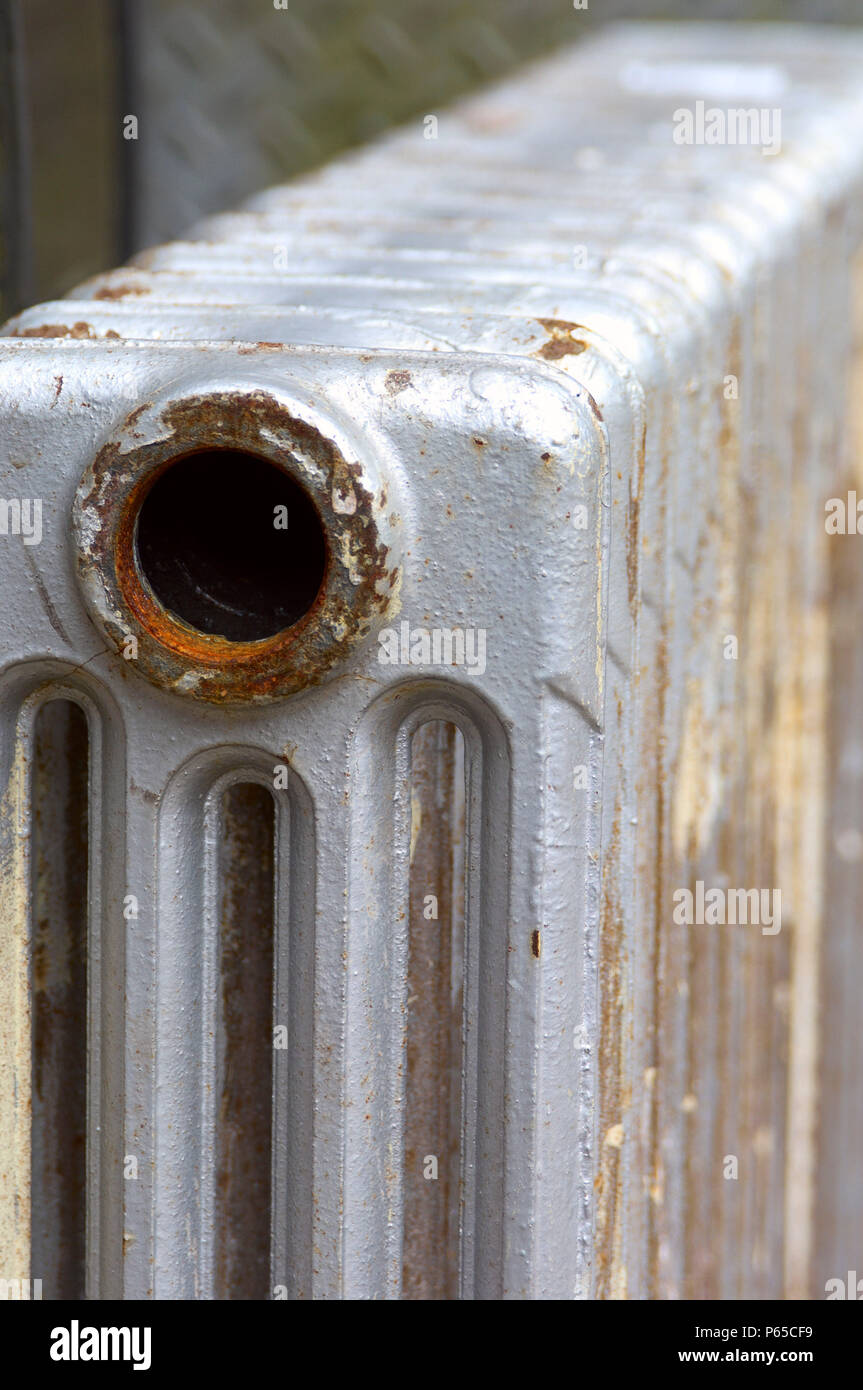 Cast iron radiators in salvage yard Stock Photo - Alamy