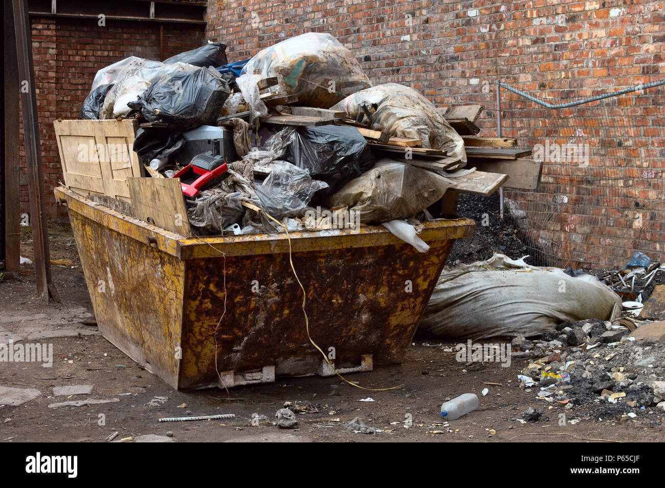 Overloaded skip hi-res stock photography and images - Alamy